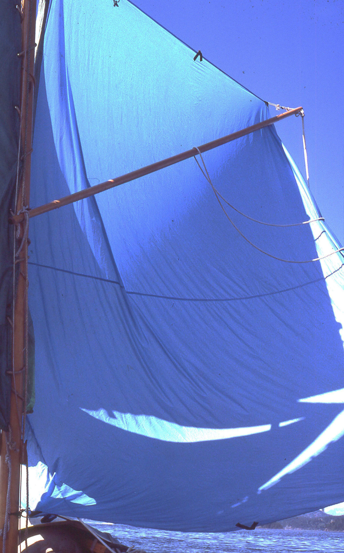A Light-Blue Tarp | Small Boats
